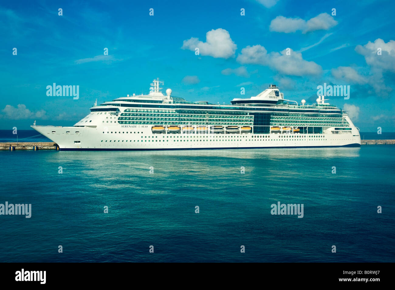 The Cruise Ship Legend of the Seas moored in the Blue Water of ...