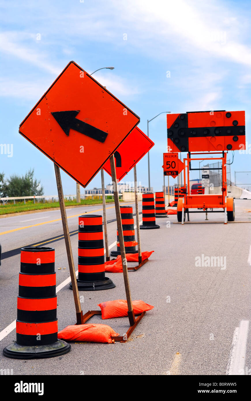 Road construction signs and cones on a city street Stock Photo - Alamy