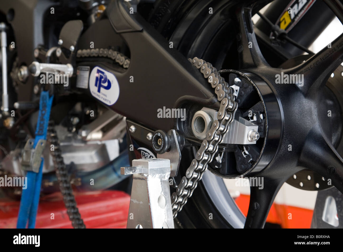 Rear wheel assembly on a racing motorcycle, Brands Hatch, Kent, England ...