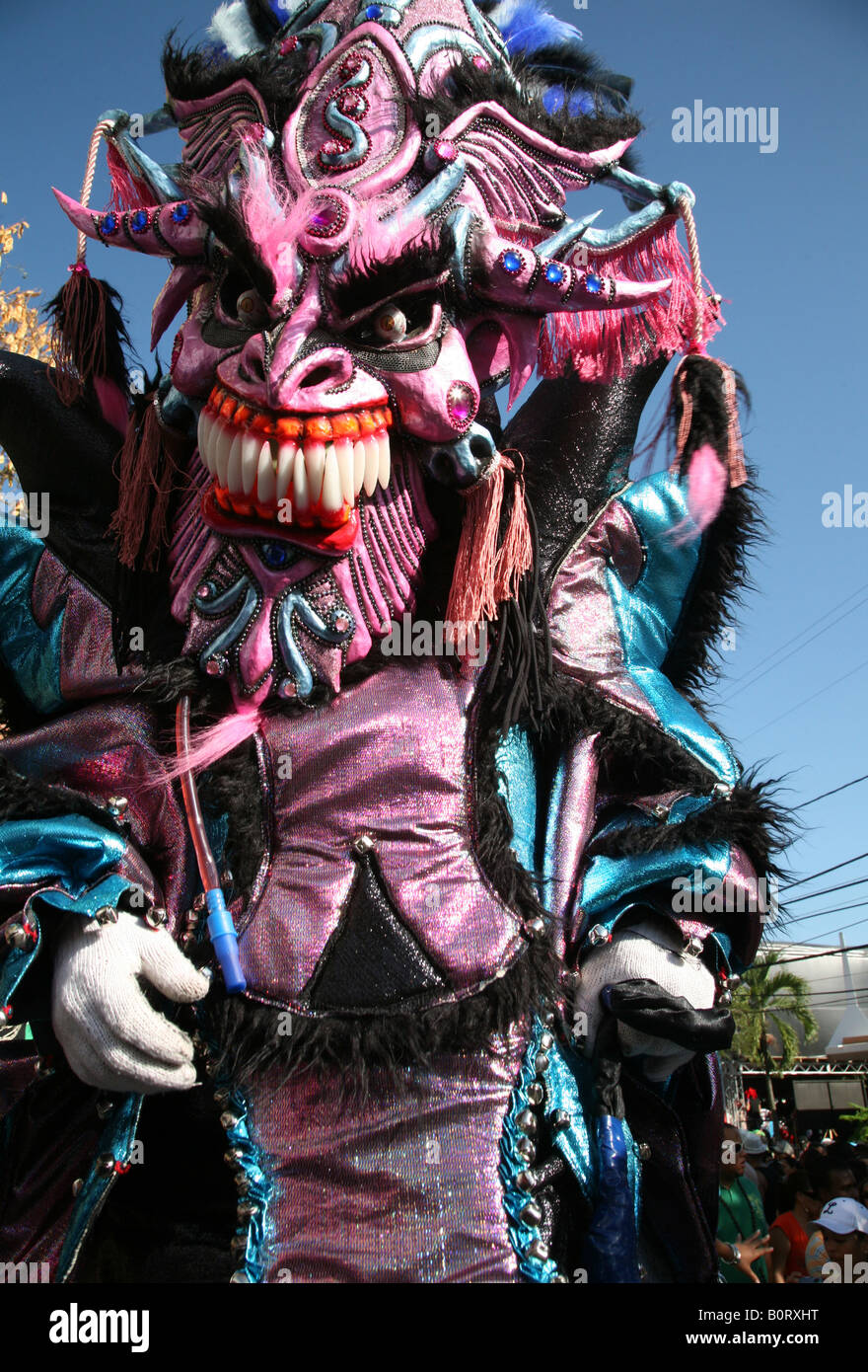 Carnival participant wearing fancy dress of Diablo Cojuelo performs ...