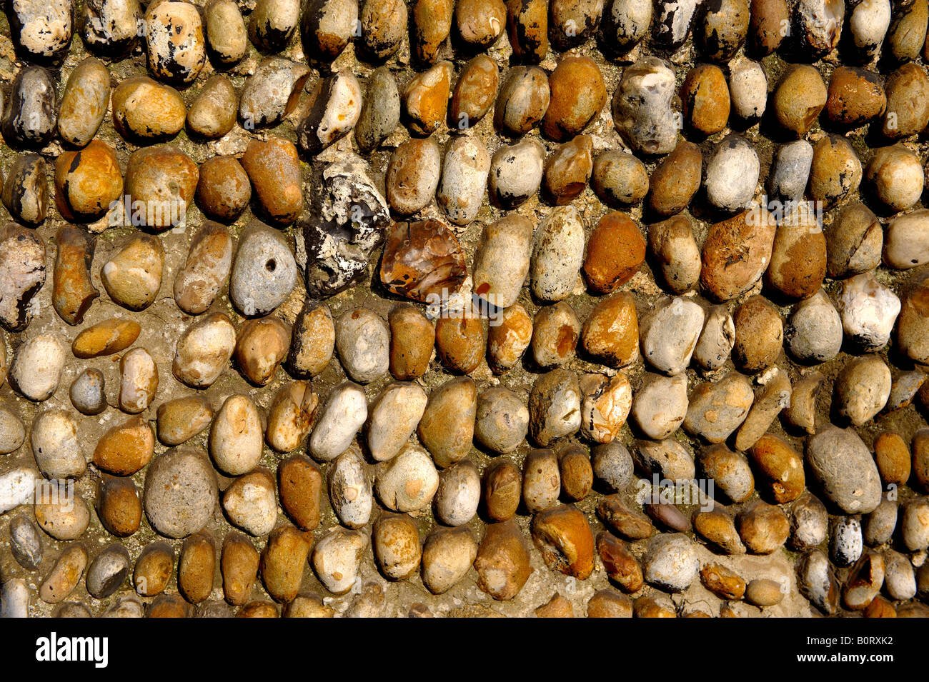 Suffolk flint stone wall Stock Photo - Alamy