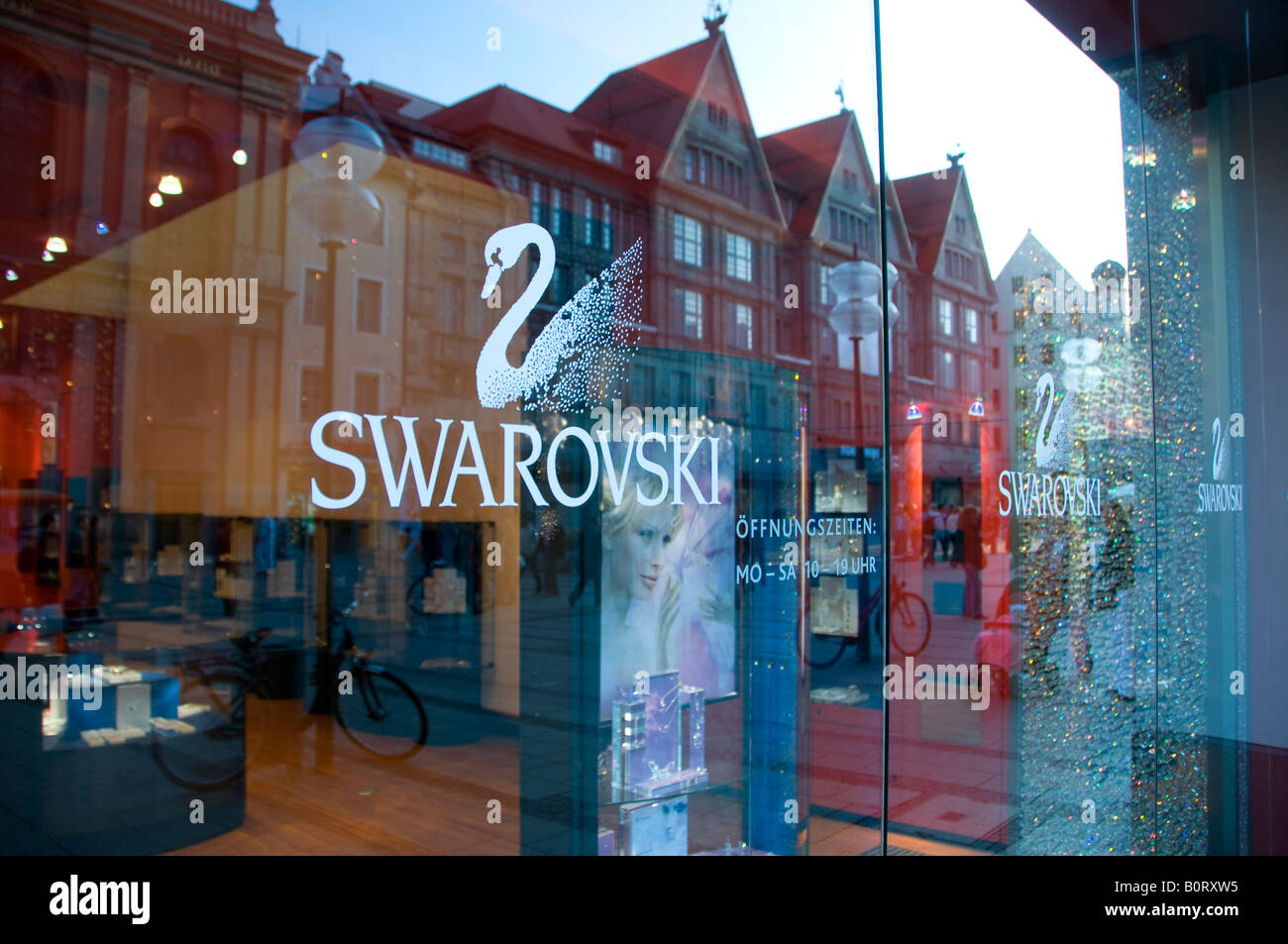 Reflection in window of Swarovski jewelry and gift shop in Kaufinger ...