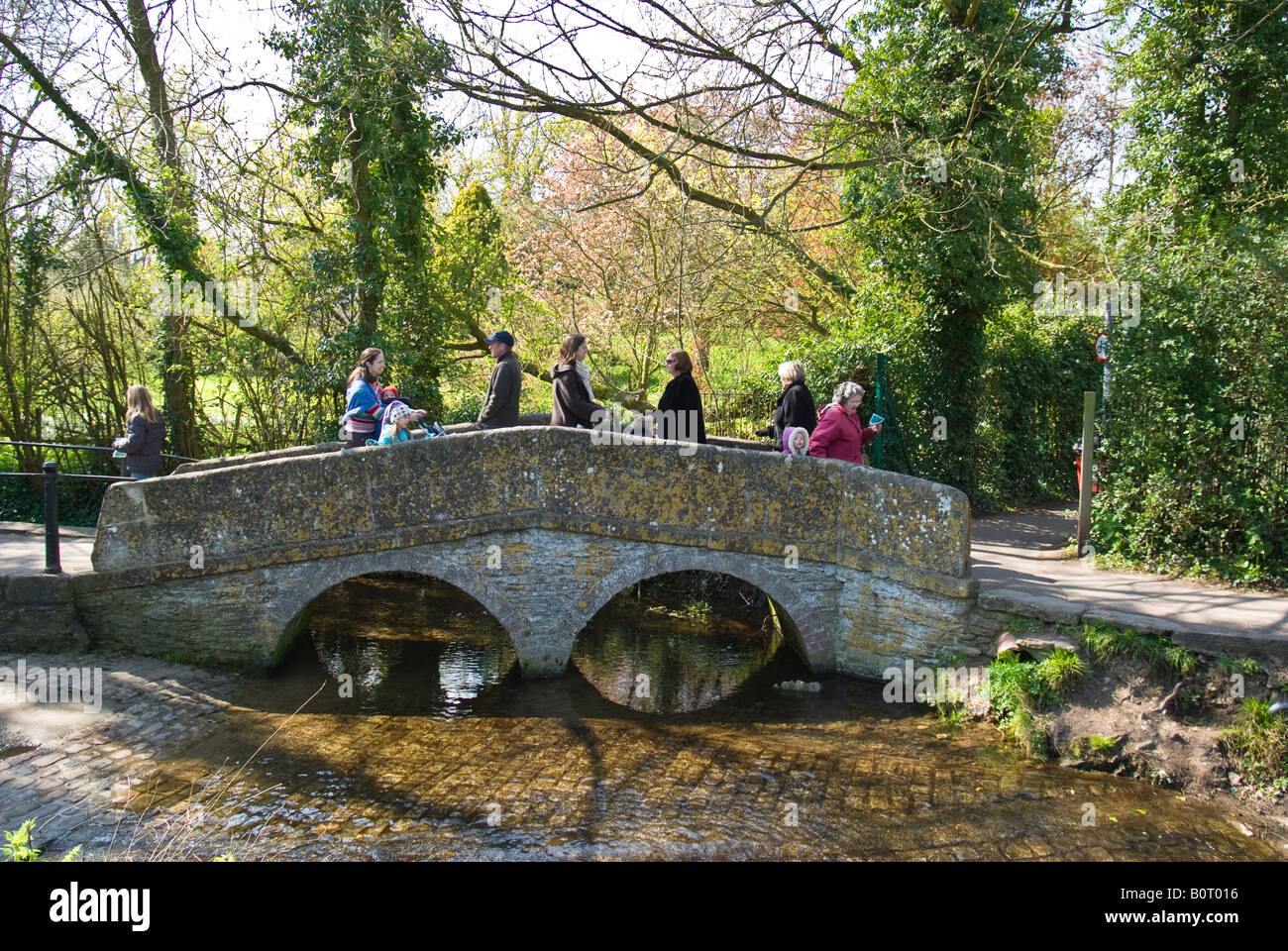 Tourists elderly people crossing bridge hi-res stock photography and ...