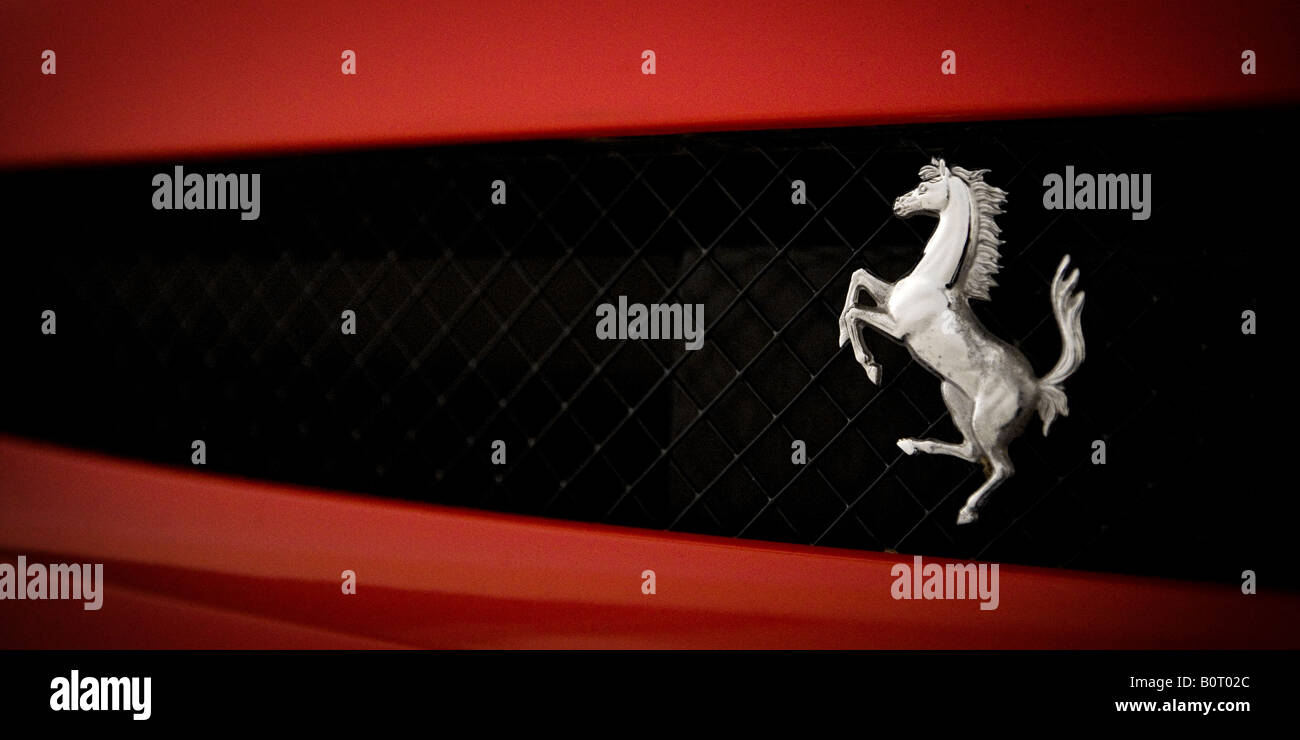 Red Ferrari badge Stock Photo - Alamy