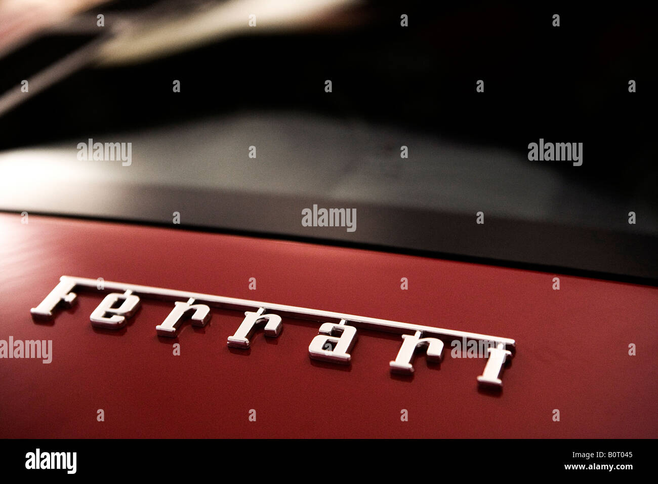 Red Ferrari badge Stock Photo - Alamy