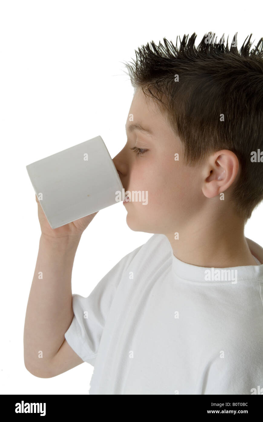 boy child drinking tea coffee hot drink mug cup break sip sipping drink ...