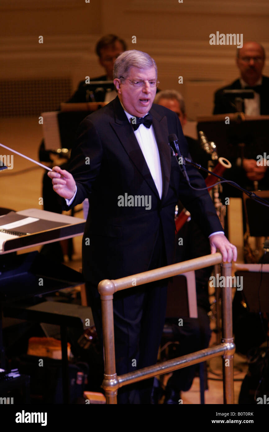 Marvin Hamlish conducting the New York Pops Orchestra at a benefit ...