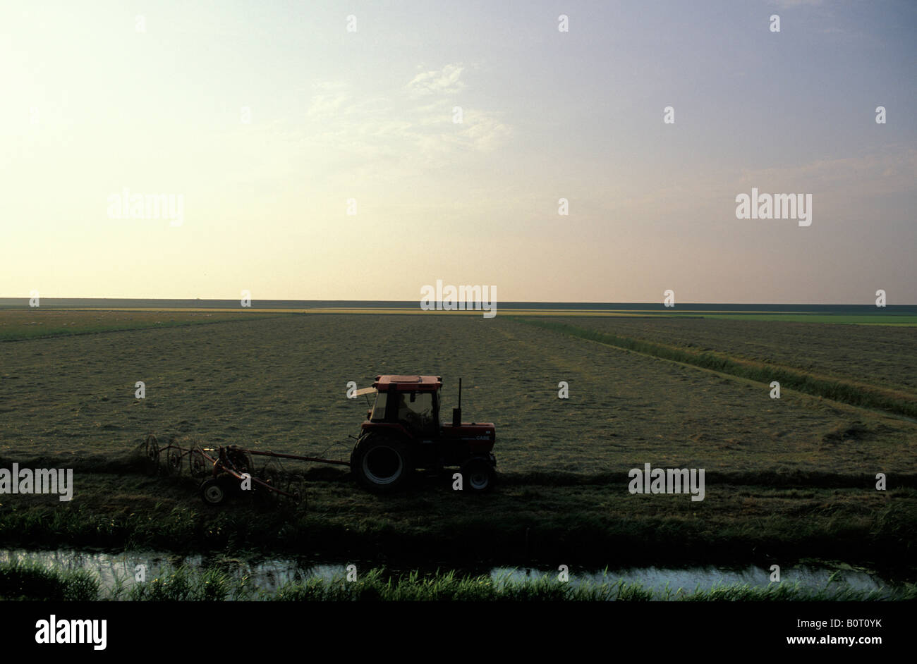 Ploughing the field on a tractor hi-res stock photography and images ...