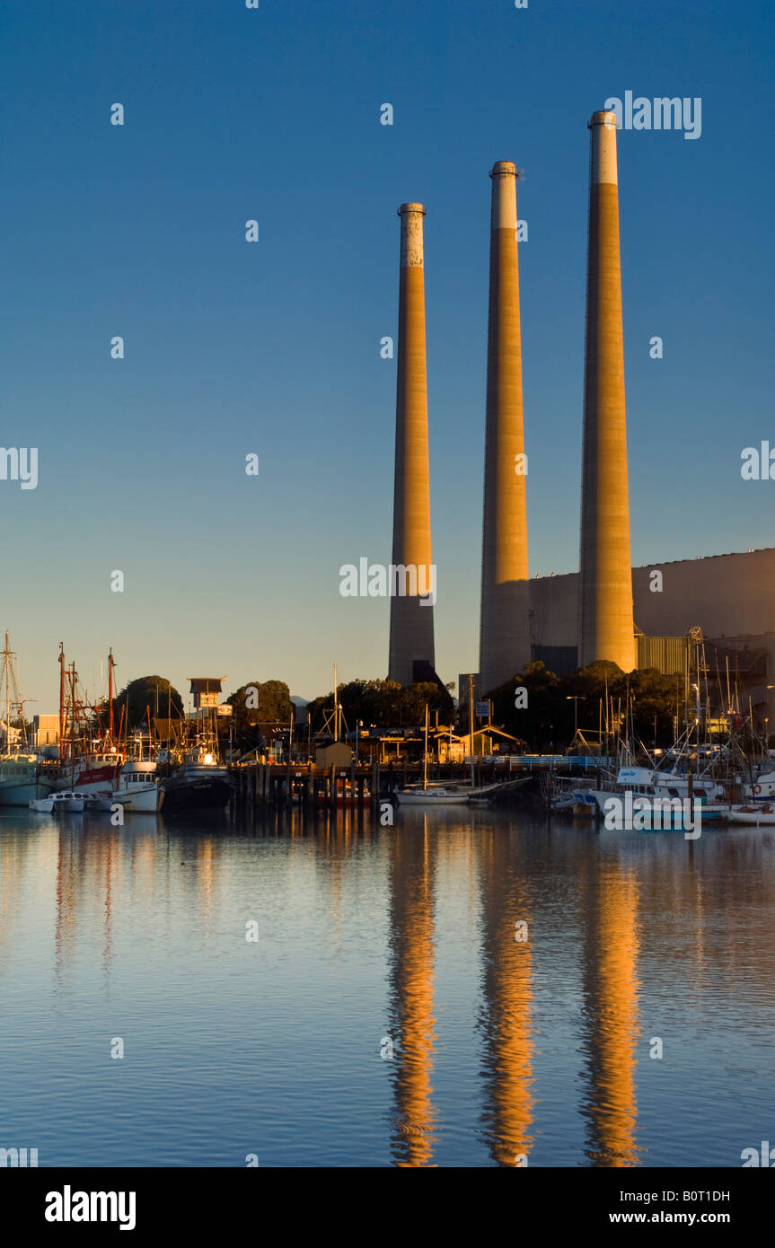 Morning light on Power Plant smoke stacks over Morro Bay harbor California Stock Photo - Alamy