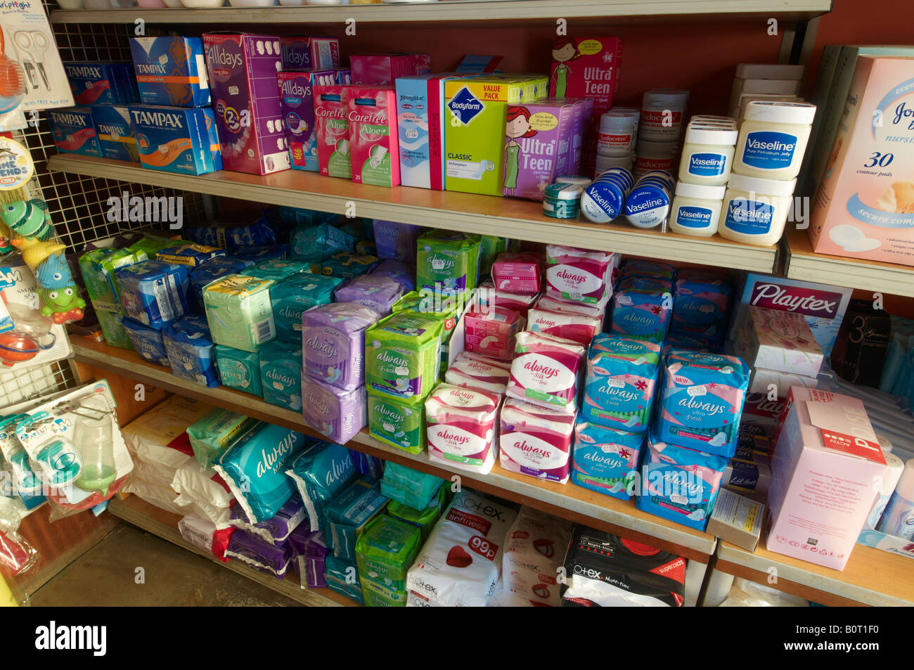 Feminine care products on shelf in chemist pharmacy shop Stock Photo ...