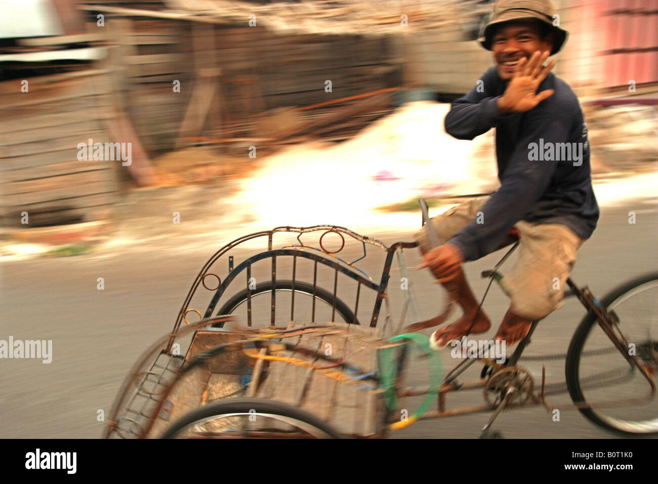Rickshaw driver, Borneo Stock Photo - Alamy
