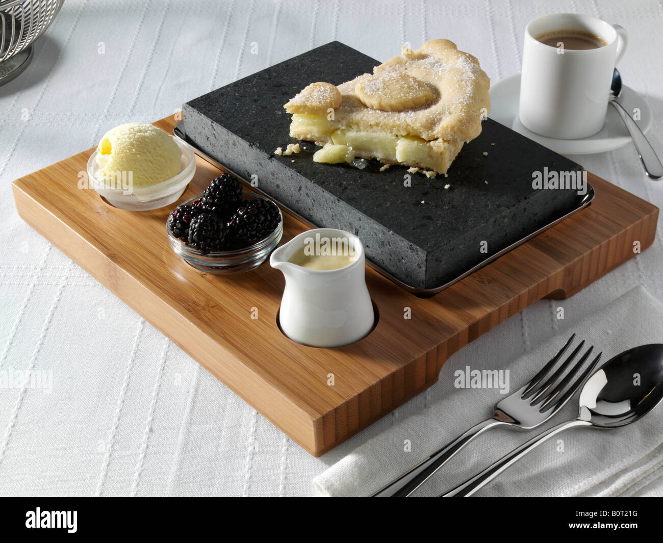 Apple Pie cooking on a hot lava stone editorial food Stock Photo - Alamy