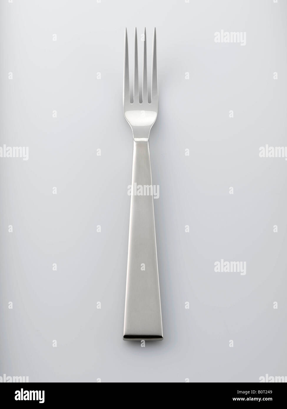 Fork on a white background graphic image Stock Photo - Alamy
