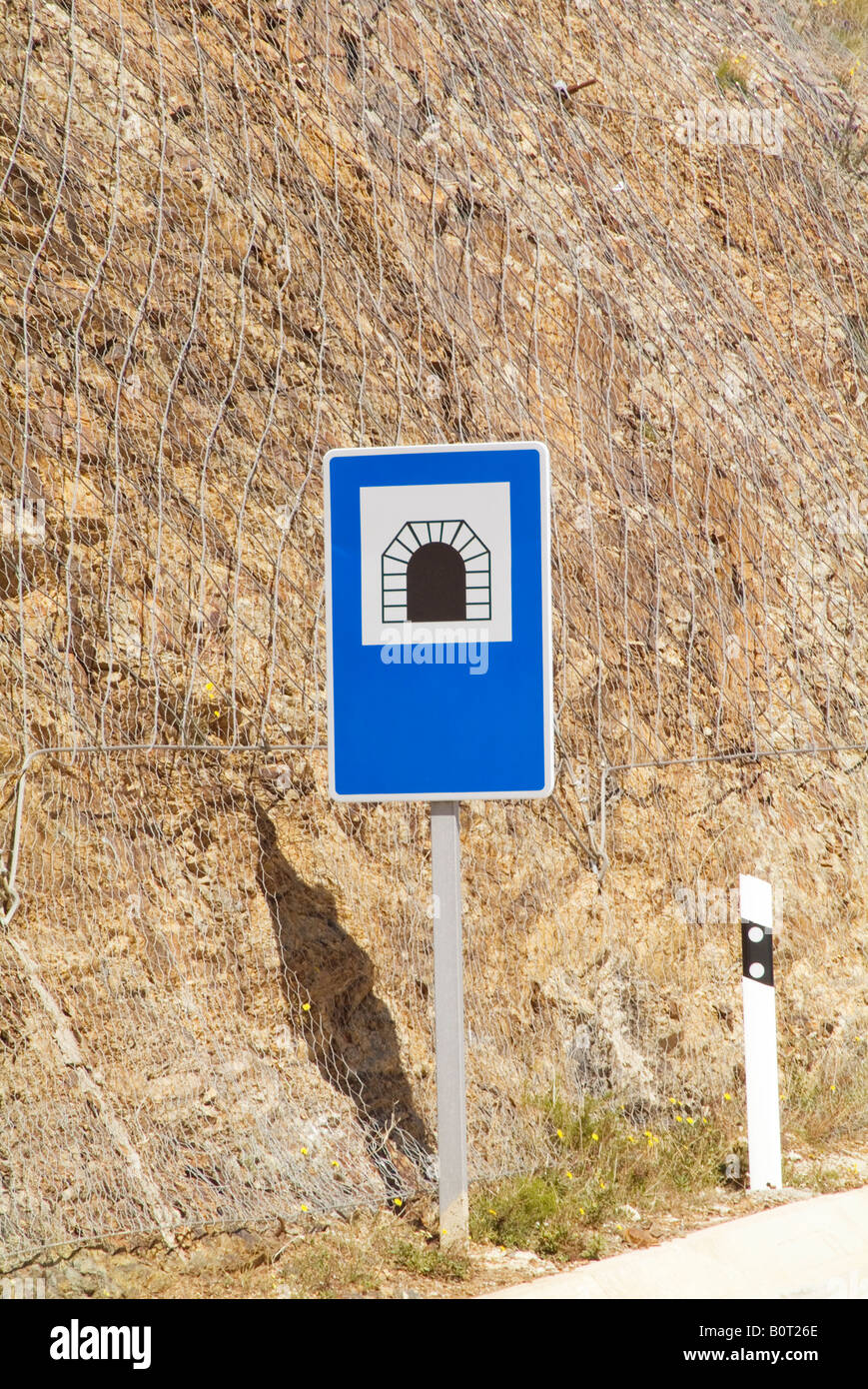 tunnel road sign warning Stock Photo - Alamy