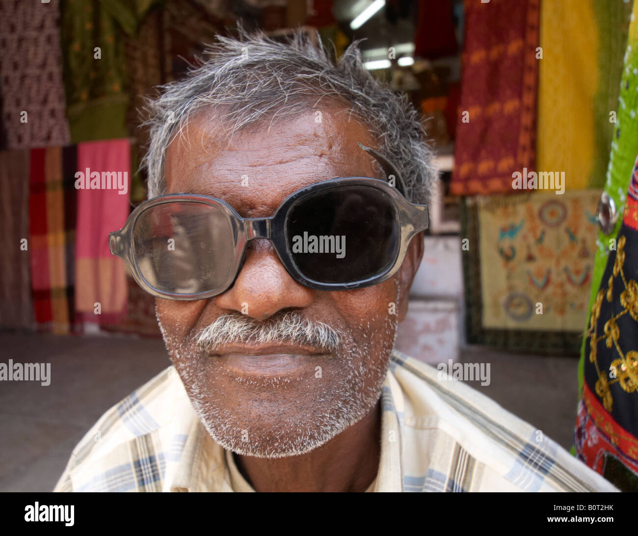 A local man in the Indian city of Jaipur poses for the camera outside a ...