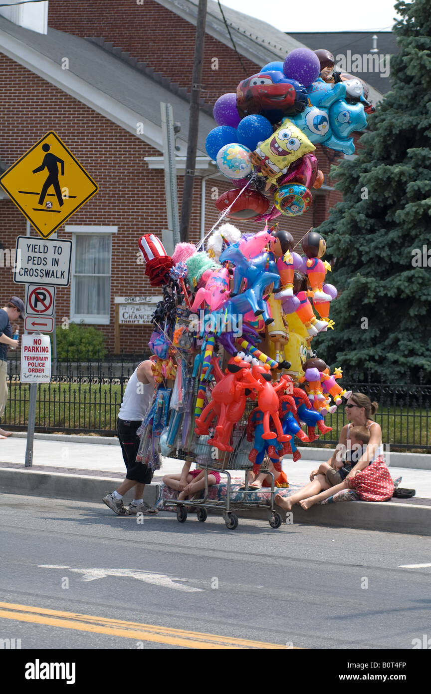 Bright colorful balloon souvenier parade vendor Stock Photo - Alamy
