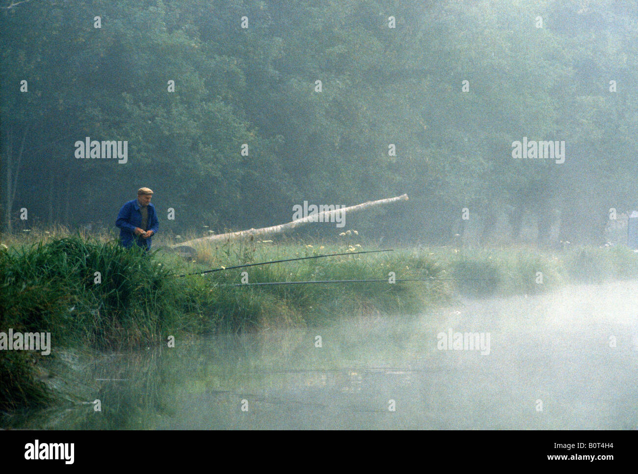 Man Fishing in Mist Canal du Midi France Stock Photo - Alamy