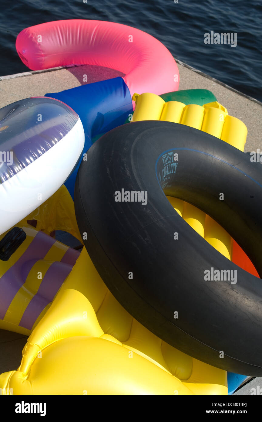 assorted rubber raft tubes at summer vacation hotel camp Stock Photo ...