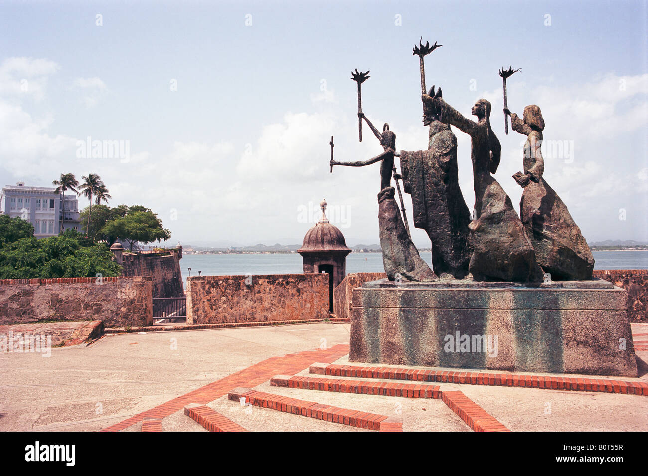 La Rogativa Plaza with the sculpture of torch carrying figures by ...