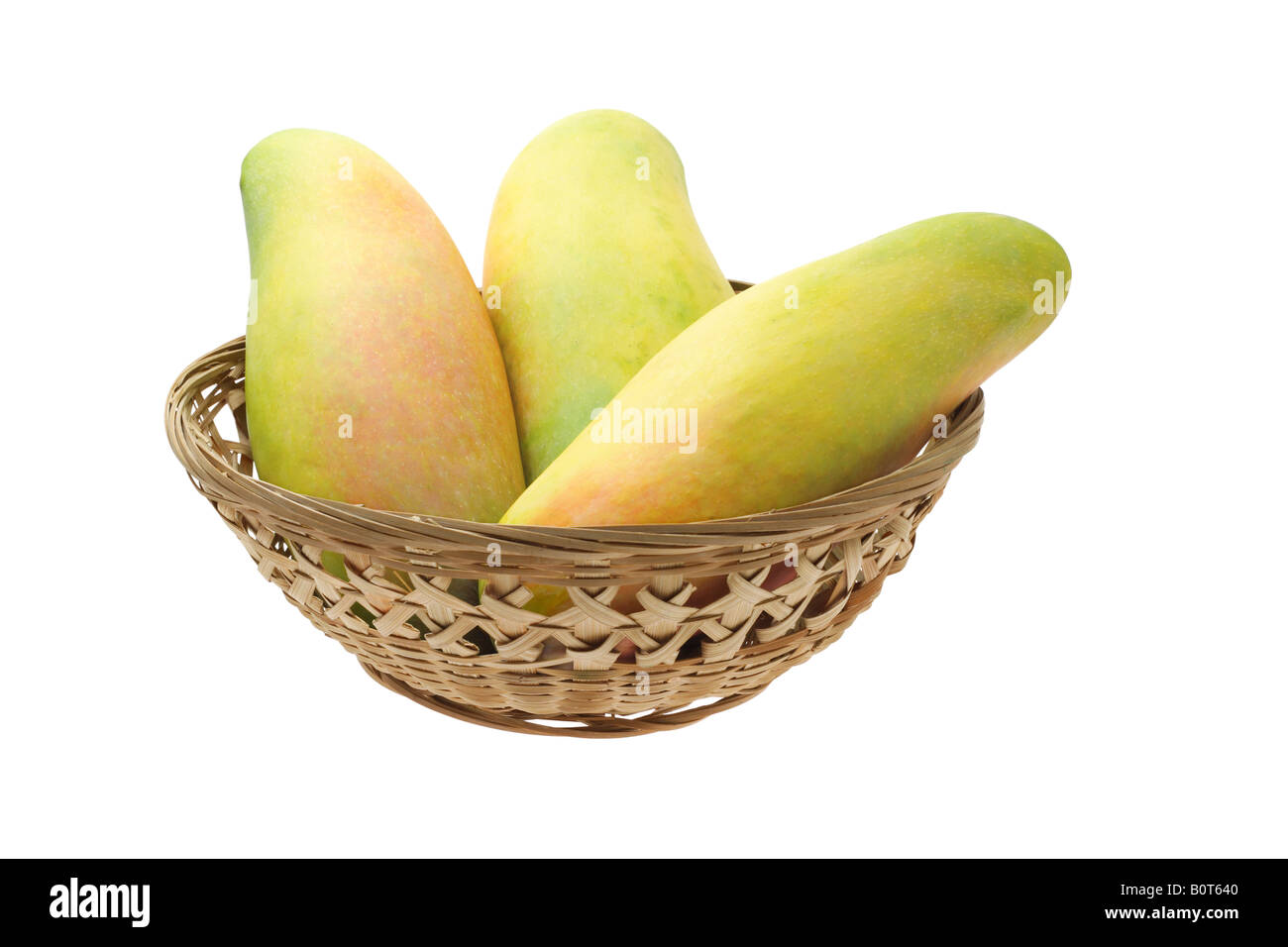 Basket of mangoes Cut Out Stock Images & Pictures - Alamy