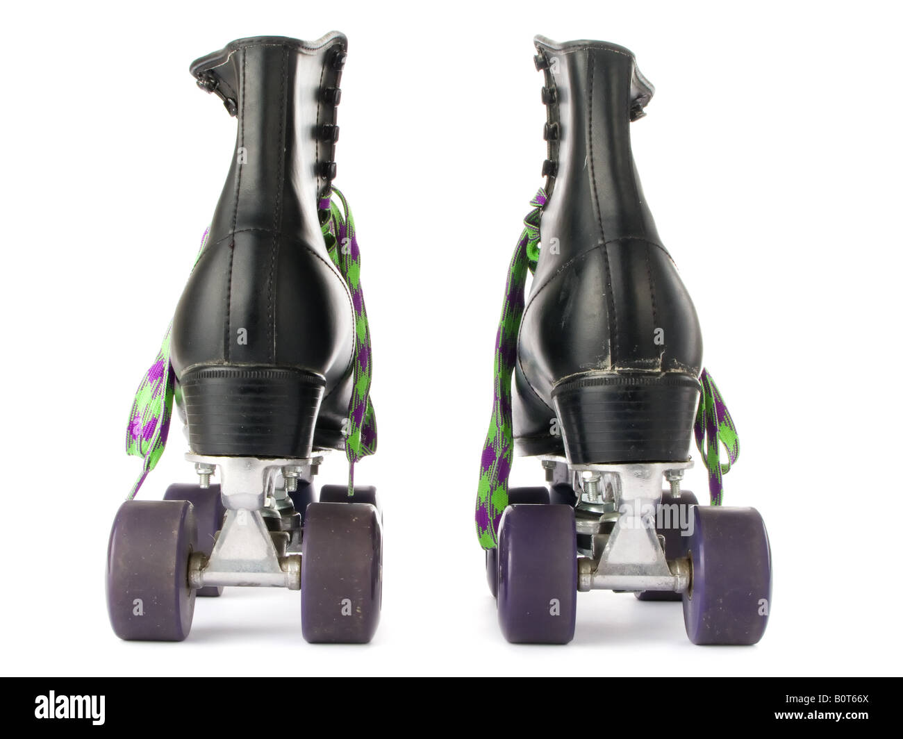 Retro roller skates isolated on white background Stock Photo - Alamy