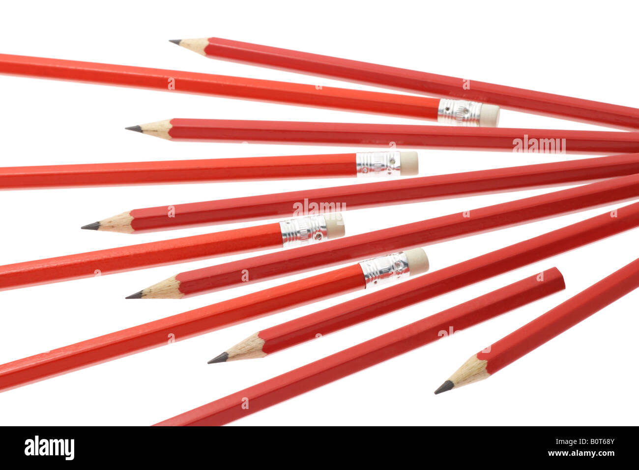 Red writing pencils arranged on white background Stock Photo - Alamy