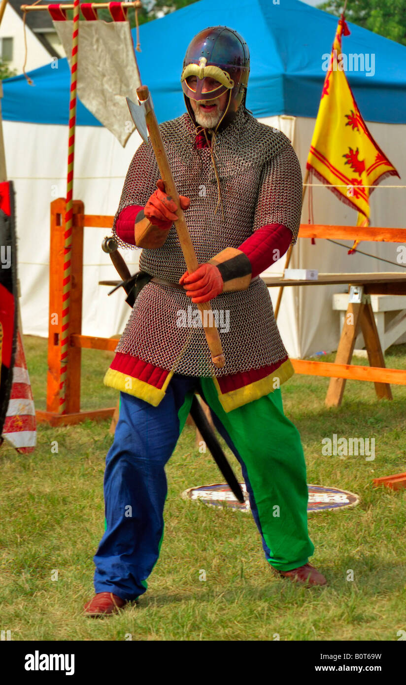An axeman demonstrates fighting techniques at a reenactment meet Stock ...