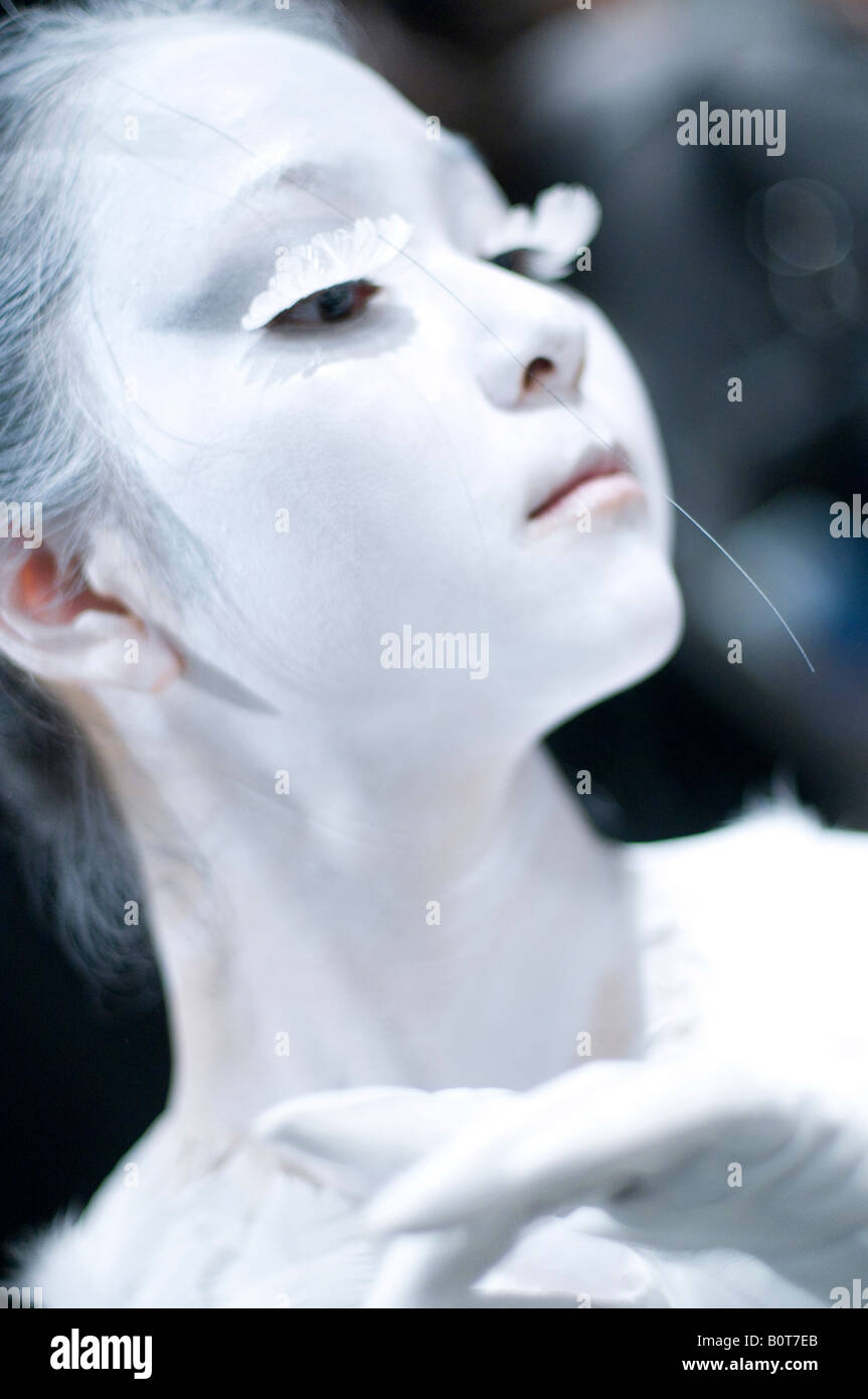 actress performing mimic with white make up and fake eyelush Stock ...