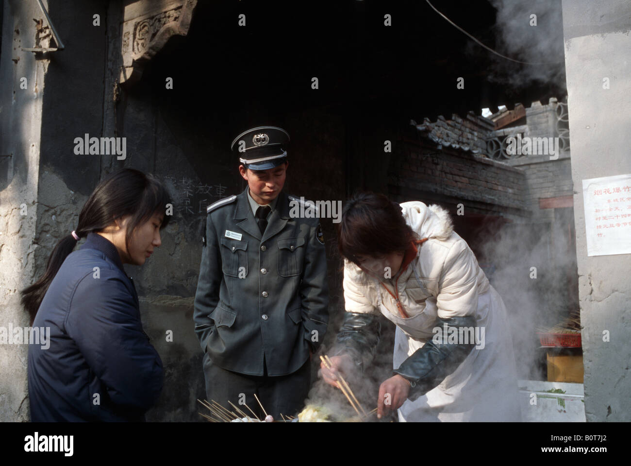 Peking people in the old city center market Stock Photo - Alamy