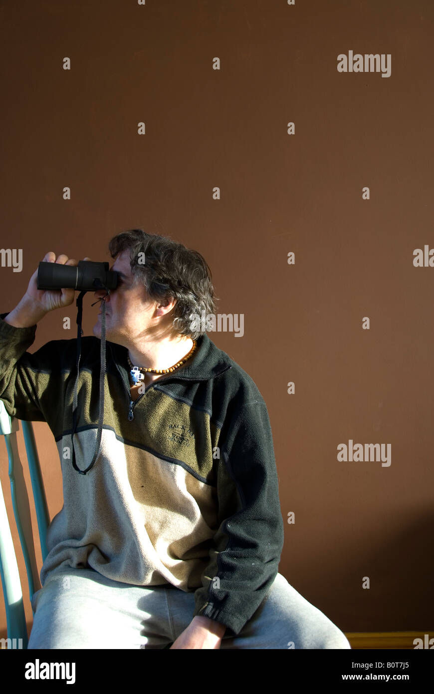 Terry Hudson Scruffily Dressed Baby Boomer Male Relaxing Sitting and ...