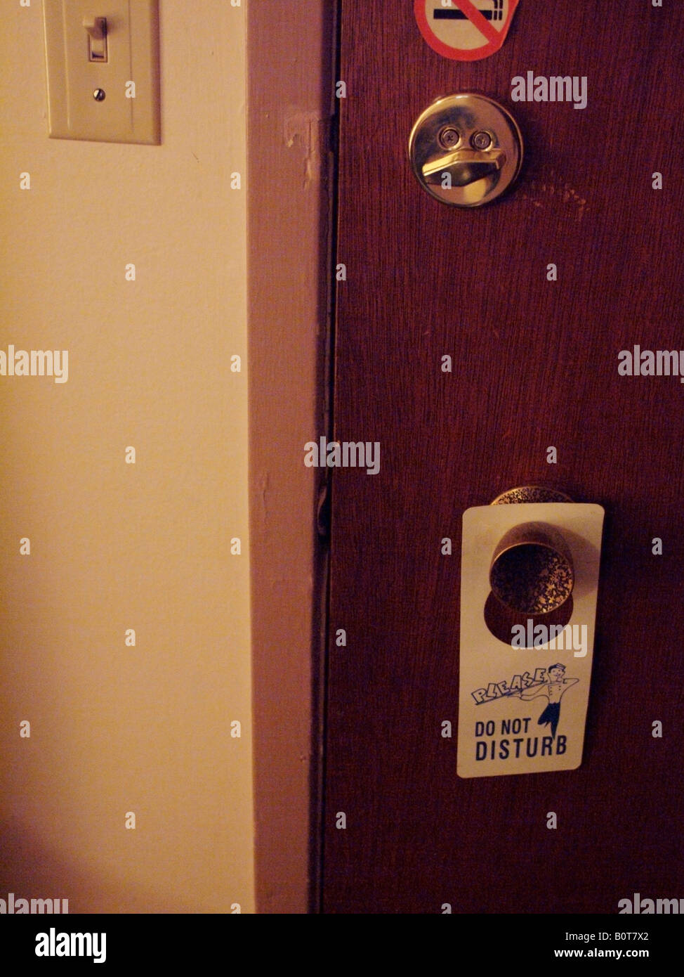 Motel door do not disturb Stock Photo - Alamy