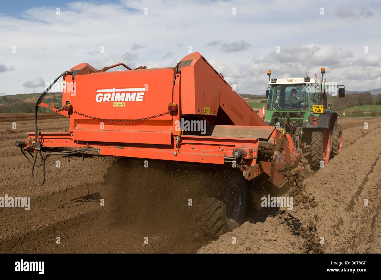 Preparing seed bed for potato crop and removing stones using a Grimme ...