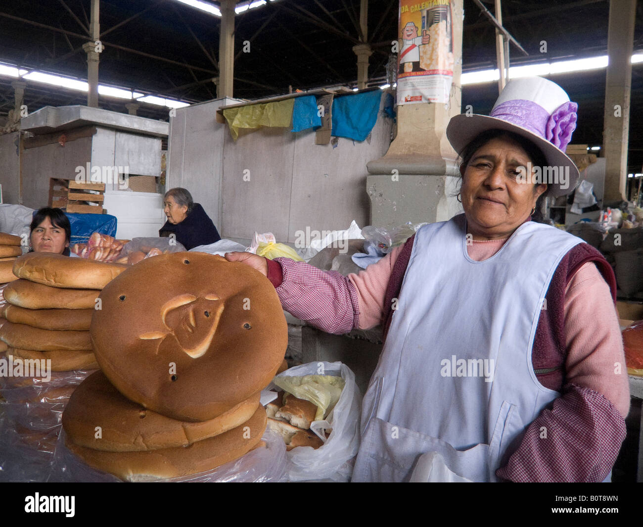 Bread seller in Cuzco market Peru Stock Photo - Alamy