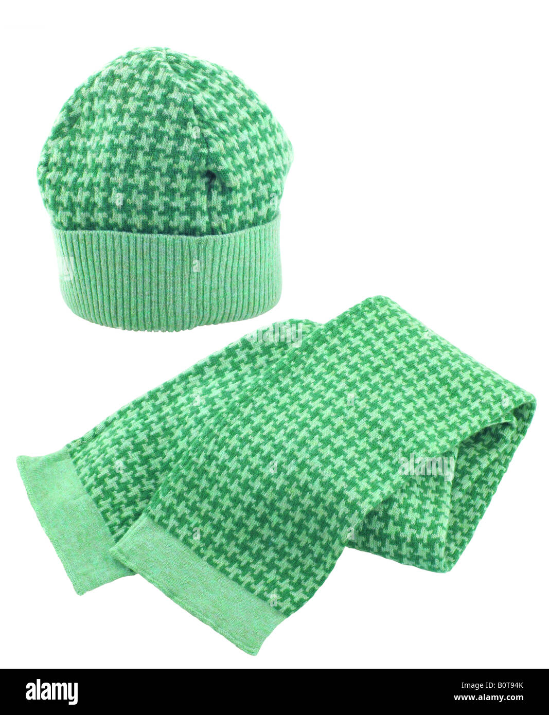 Green wool scarf and cap isolated on white background Stock Photo - Alamy