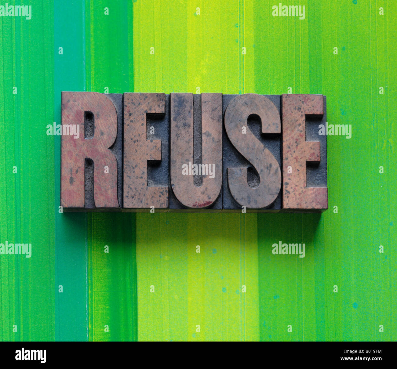 the word 'reuse' in letterpress wood type on a green background Stock ...