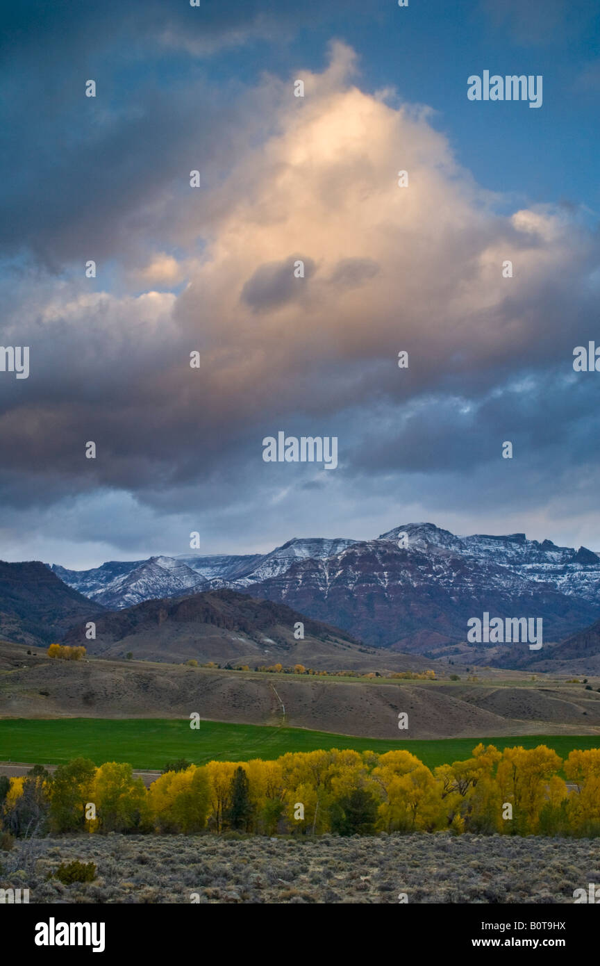 Evening storm clouds over Jim Mountain and farm pasture fields in fall ...