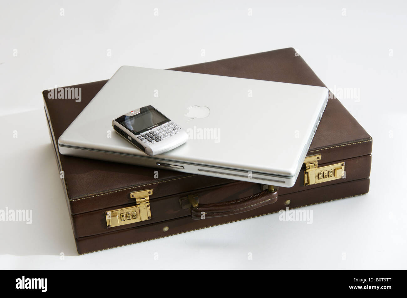 Briefcase laptop an phone Stock Photo - Alamy