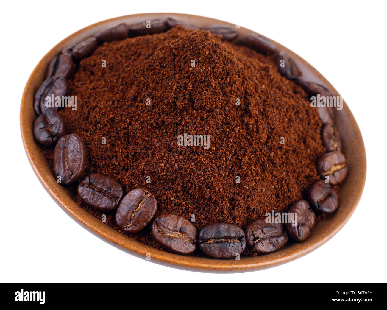 Ground coffe bean isolated on white background Stock Photo - Alamy