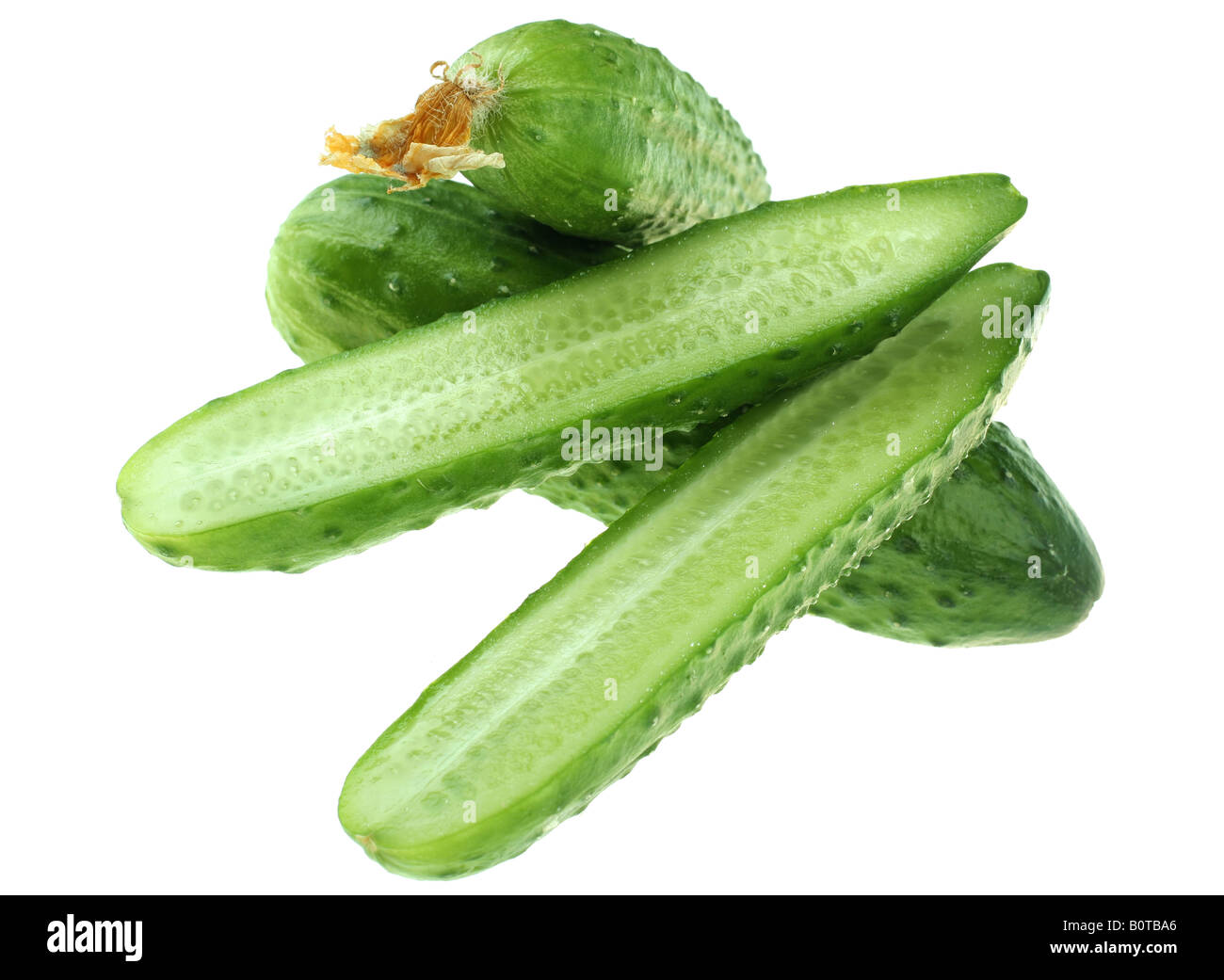 Green cucumber group isolated on white background Stock Photo - Alamy