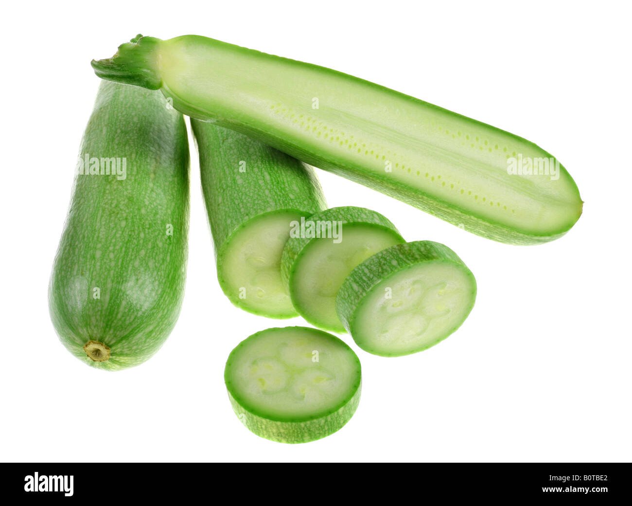 Green zucchini vegetable isolated on white background Stock Photo - Alamy