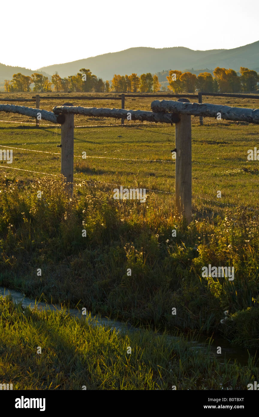 Wood posts and wire fence next to corral Mormon Row Grand Teton ...