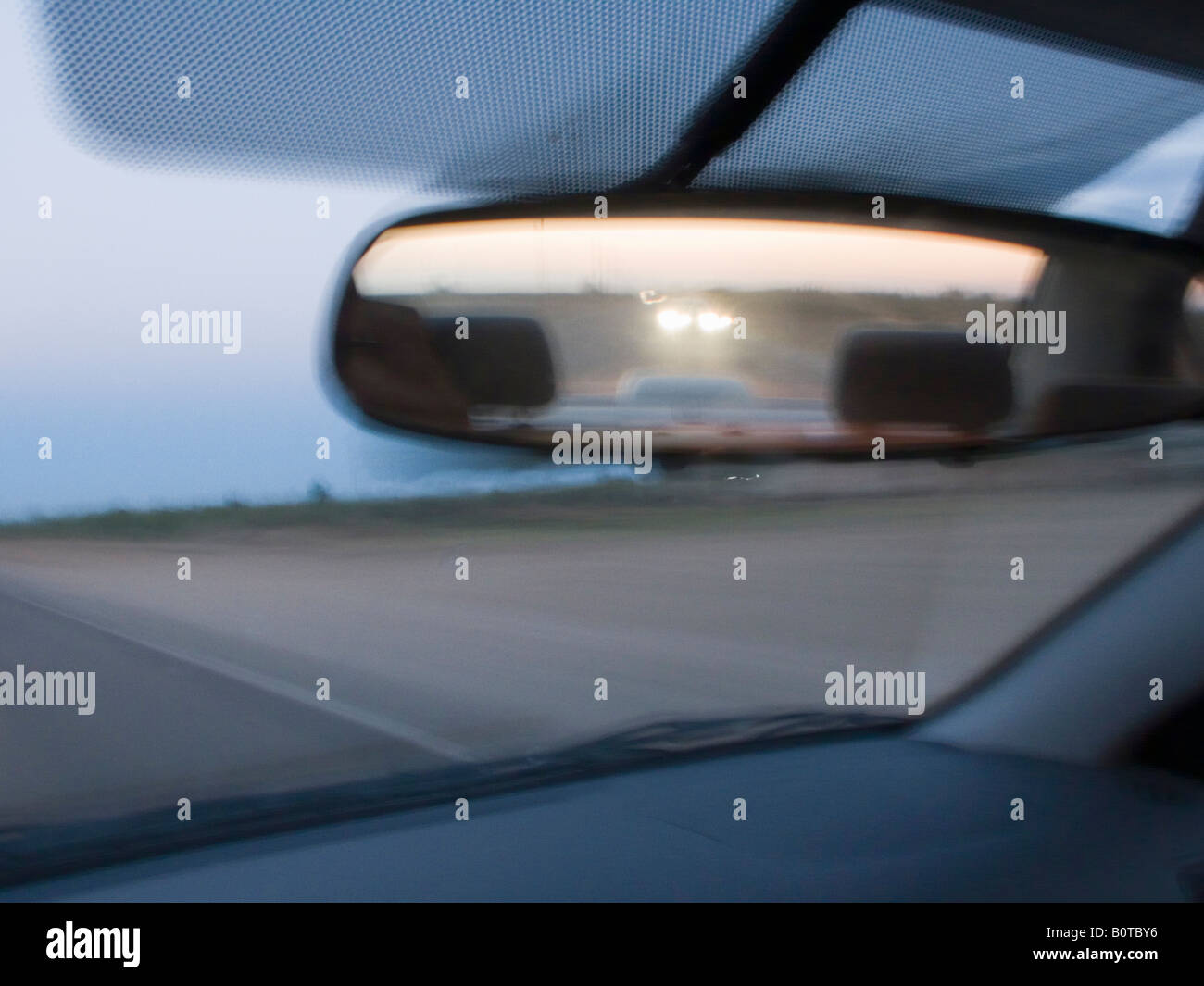Inside a car interior while driving at dawn Stock Photo - Alamy