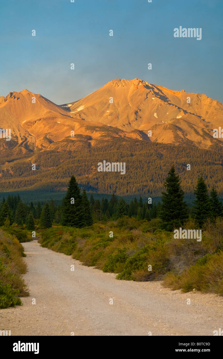 Dirt road below Mount Shasta Volcano at sunset Cascade Range Siskiyou ...