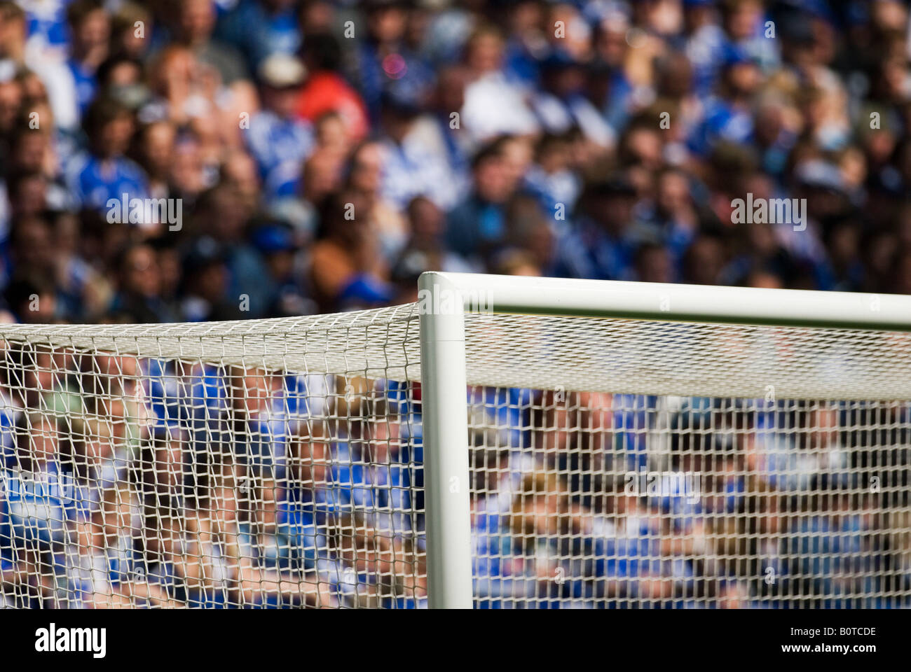 upper goal corner in filled football stadium Stock Photo - Alamy