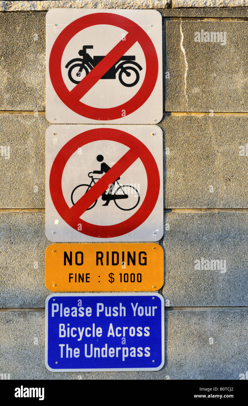 No cycling and penalty notices in Singapore Stock Photo - Alamy