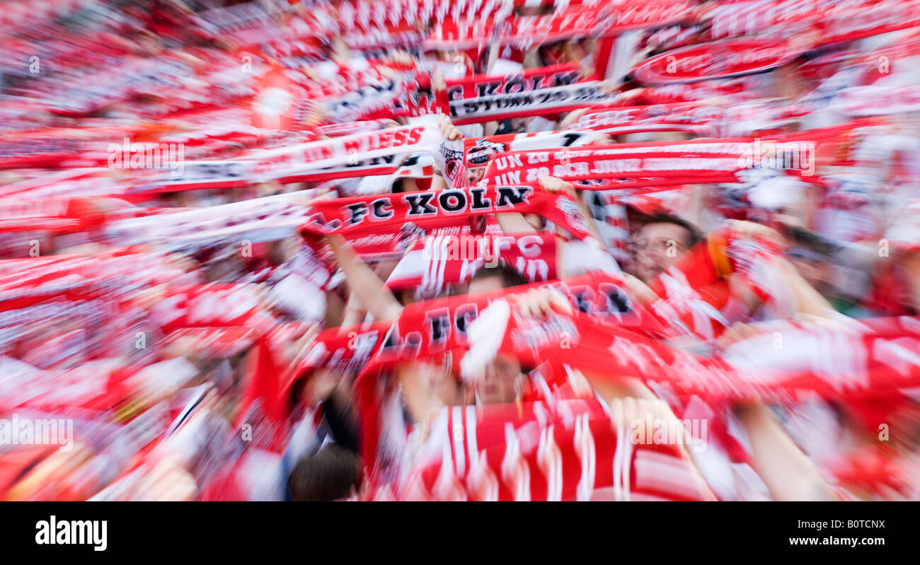 Football Fans of german Club 1 FC Cologne present their scarves in ...