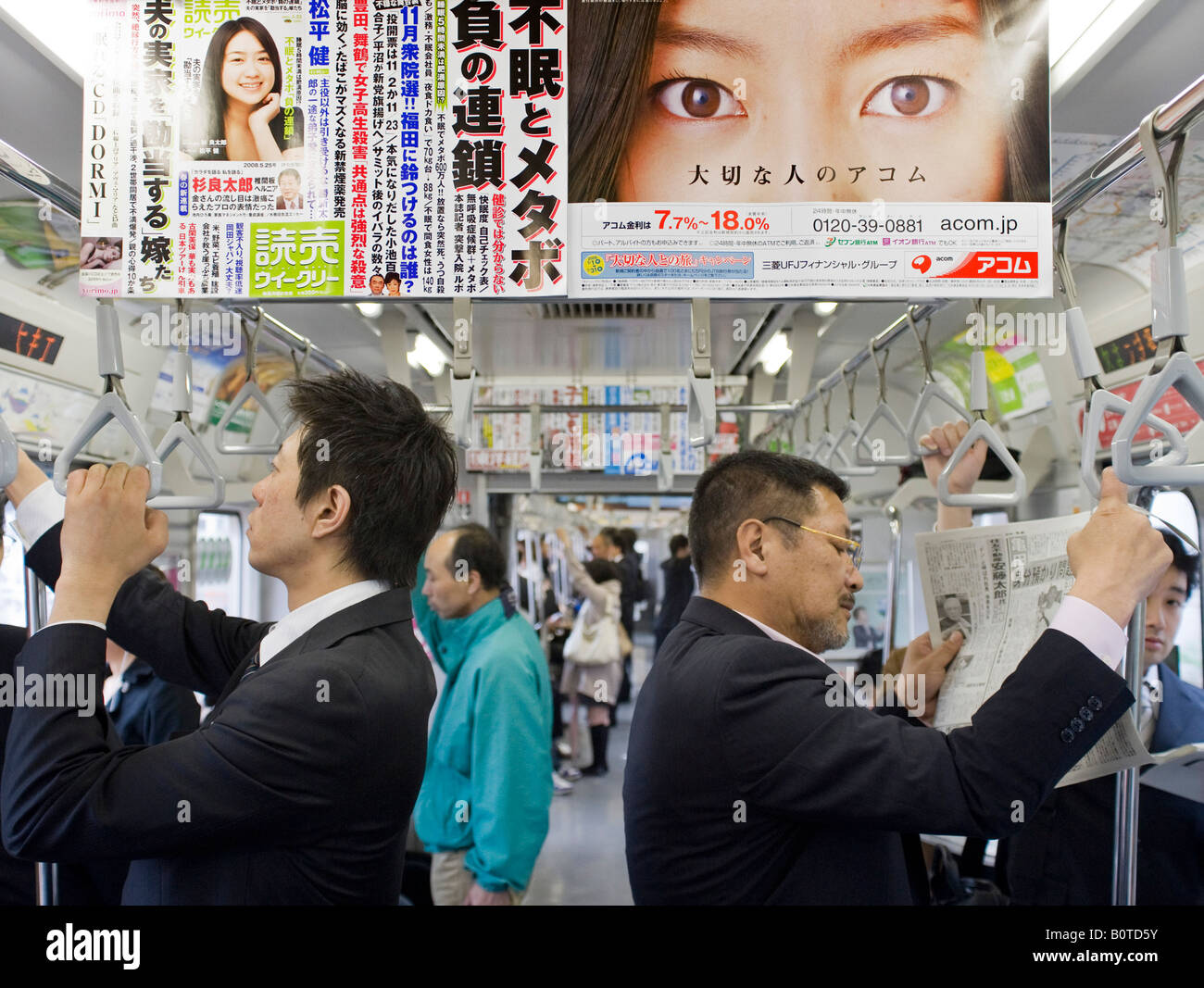 Advertising poster in carriage on railway train in Tokyo Japan Stock ...