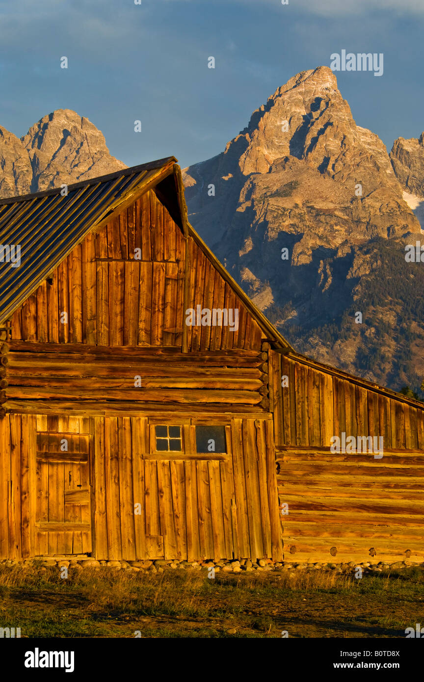 Old wooden barn and mountains in morning light along Mormon Row Grand ...