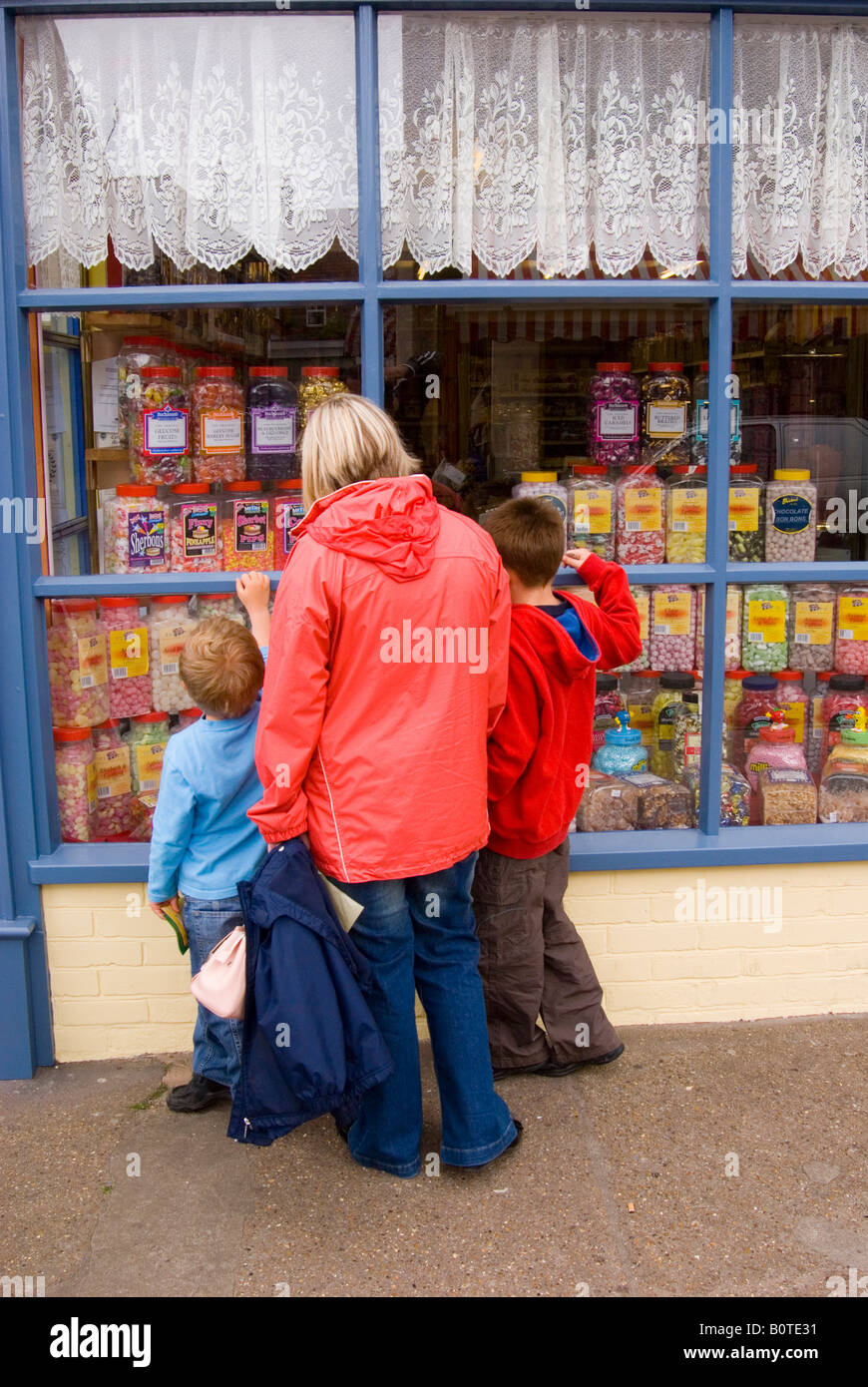 Family Viewing Sweets At Traditional English Sweet Shop in the uk Stock ...