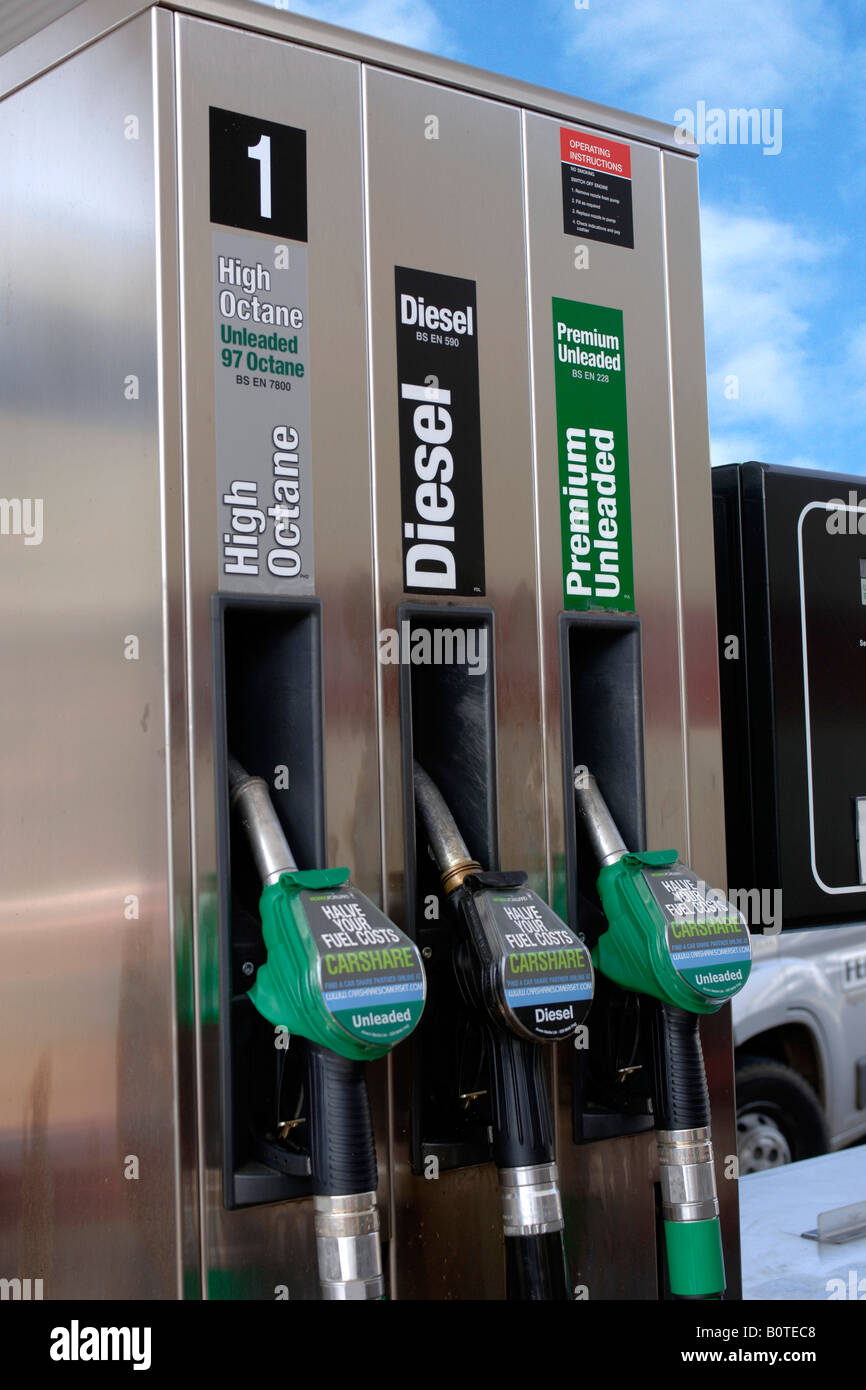 Three petrol pum nozzles at a filling station High octane Diesel and ...